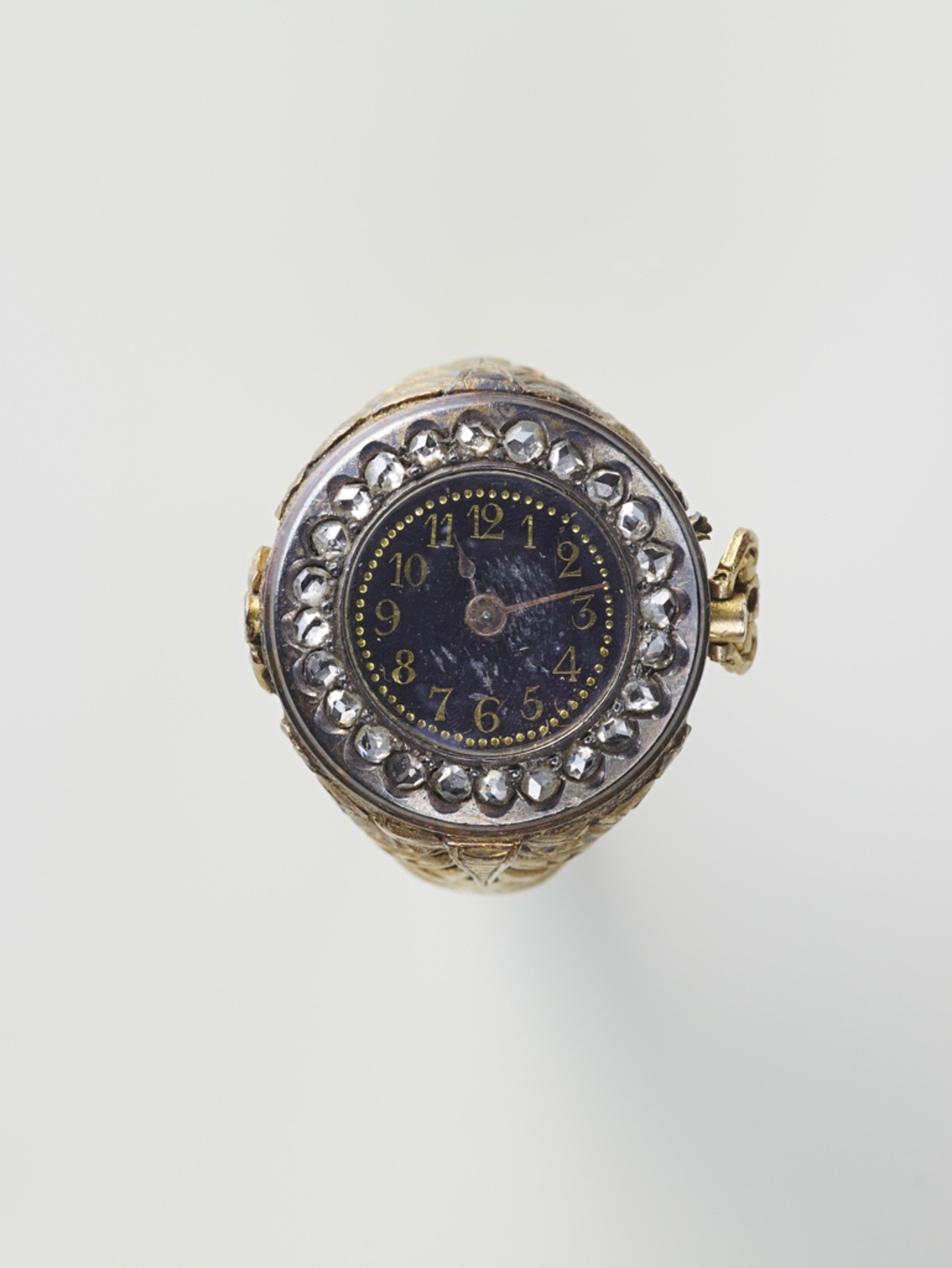 Gold Ring Watch with a Bezel Outlined in Rose Diamonds| |Search ...
